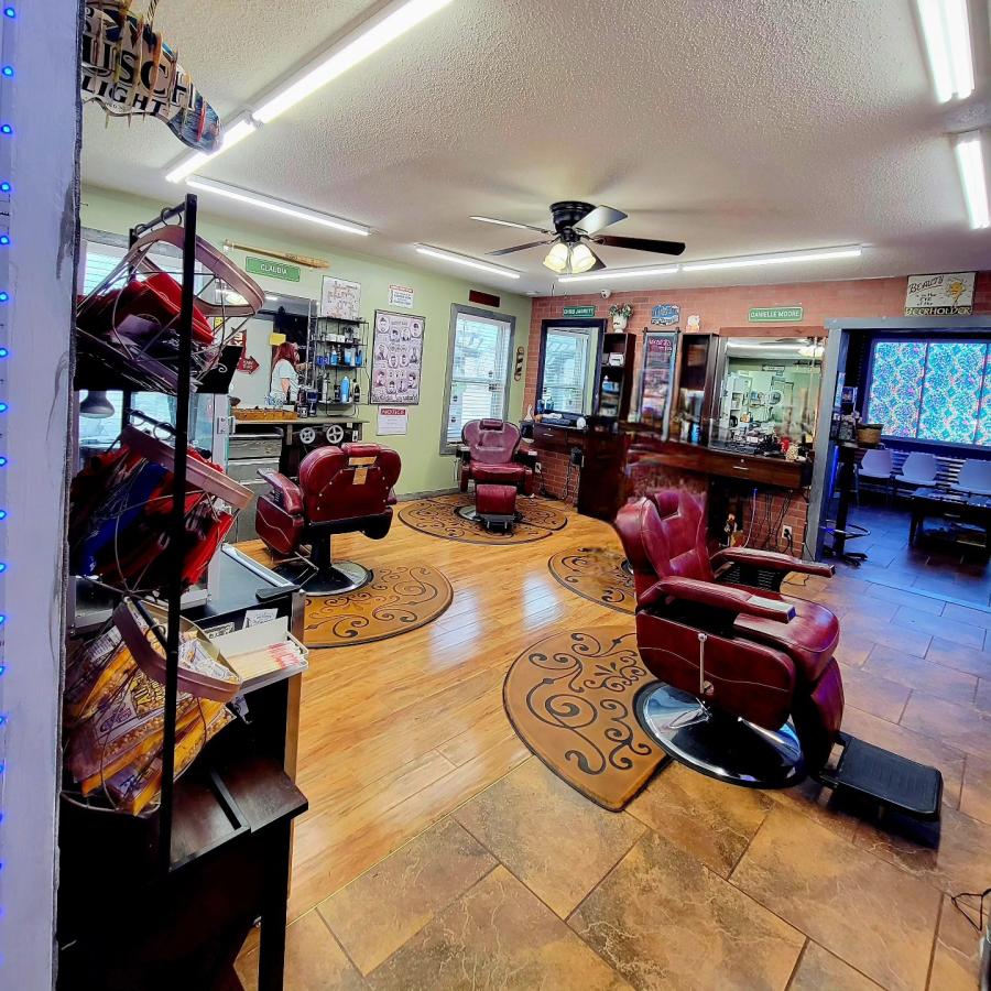 $2 Off ANY Haircut offered by Happy Hour Barber Stop | RiverBender.com