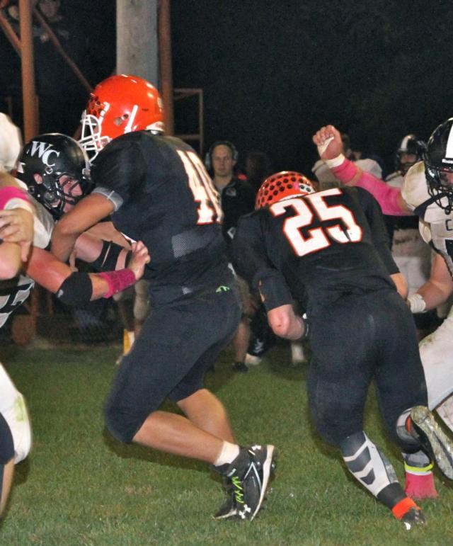 Greenfield-Northwestern win again over Triopia 52-20, Grigsby dominates ...