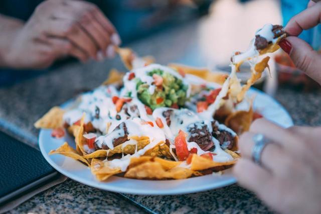 The History and Traditions of National Nachos Day | RiverBender.com