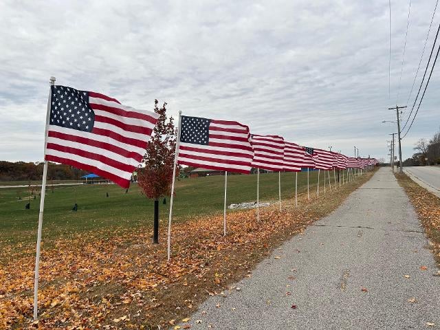 Optimist Club Displays 100 Flags for Veterans Day | RiverBender.com
