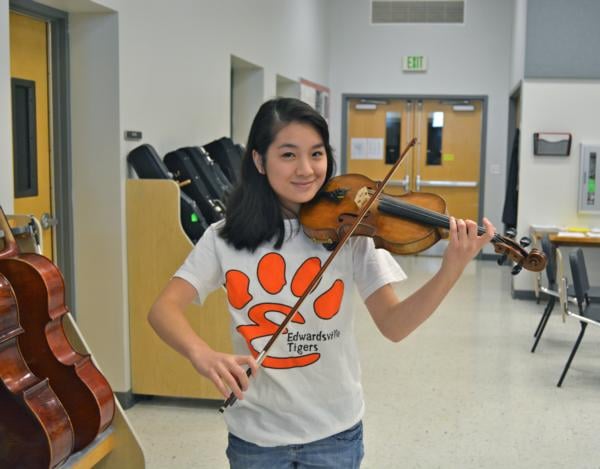 Tan plays soulful violin rendition of National Anthem | RiverBender.com