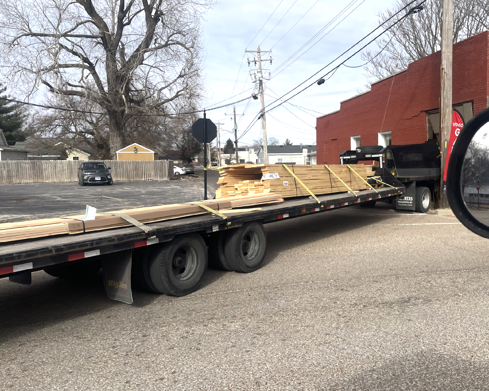 Lumber Delivery Truck Stuck in Vacant Building After Crash ...