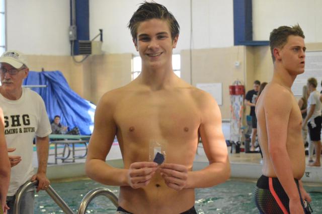 Alton High School freshman Noah Clancy shines in 100 backstroke, heads ...