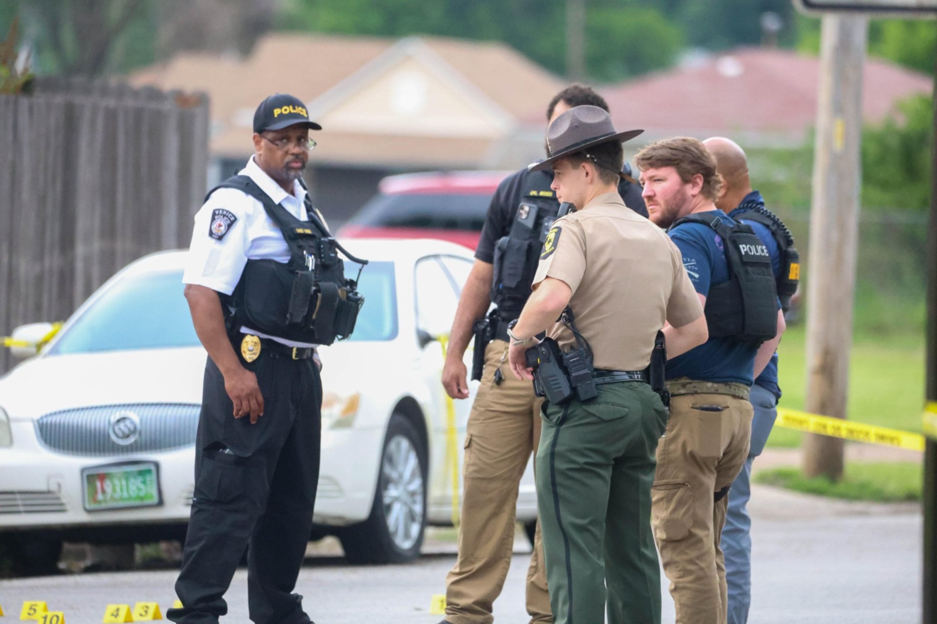 Evidence Markers Cover Intersection After Reported Shooting ...
