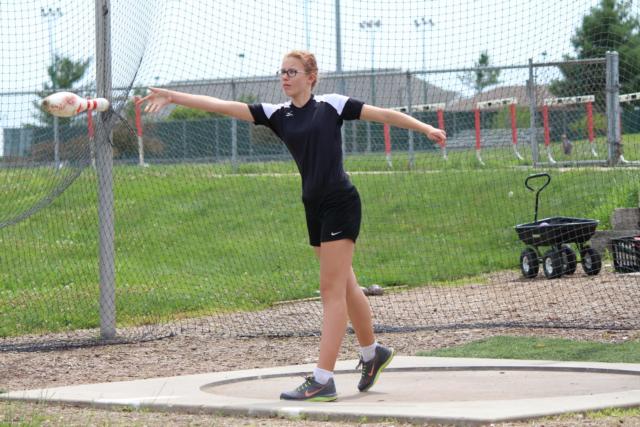 Young athletes learn shot put, discus at Throws Camp | RiverBender.com