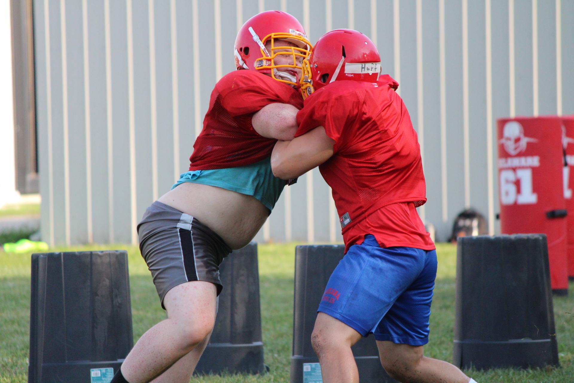 One team, one goal: Roxana Shells ready to hit the gridiron ...