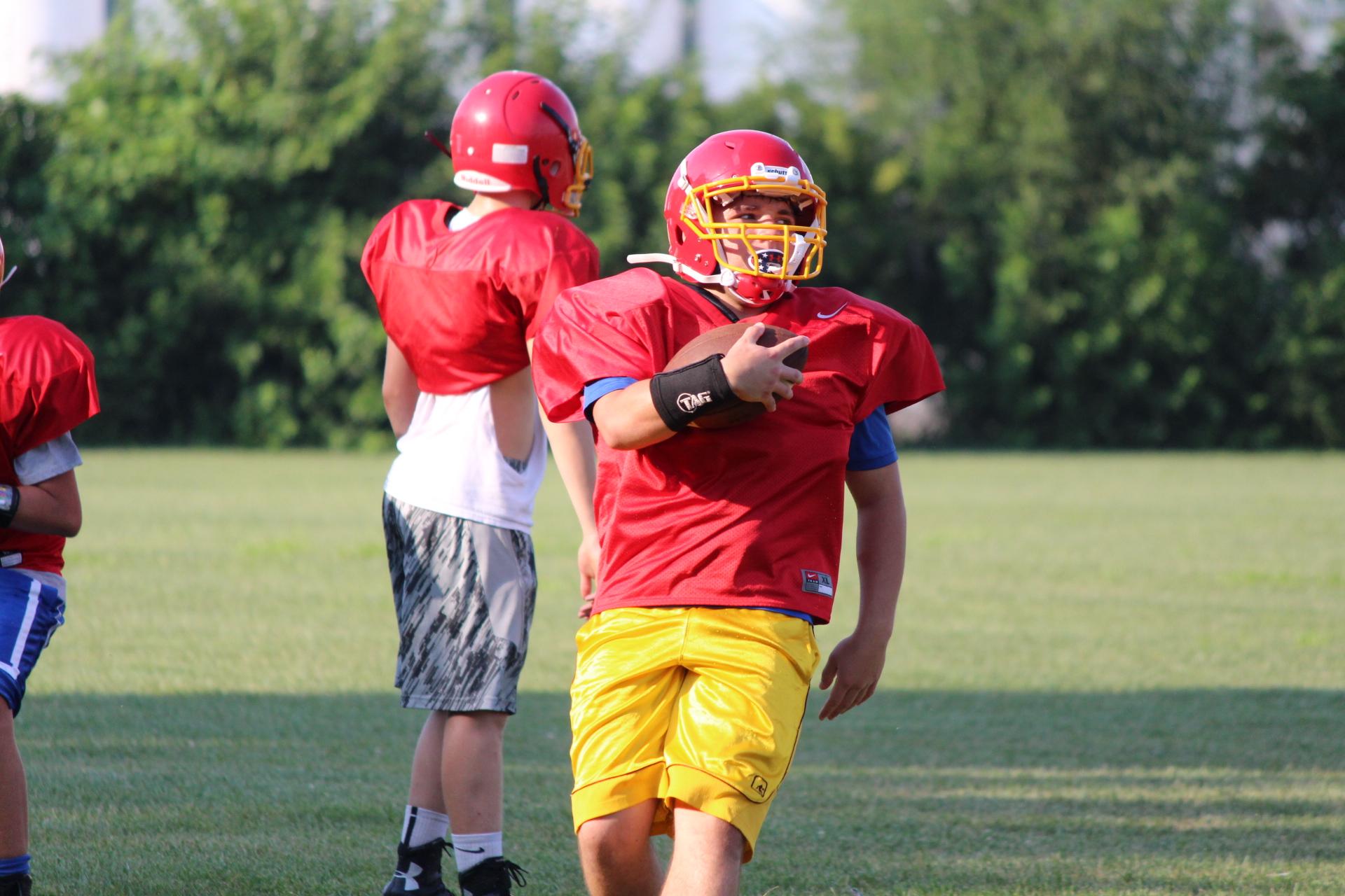 One team, one goal: Roxana Shells ready to hit the gridiron ...